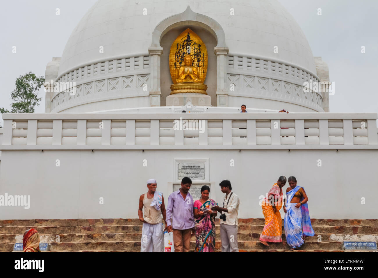 Visitors and a photographer at Vishwa Shanti Stupa (Peace Pagoda) in ...