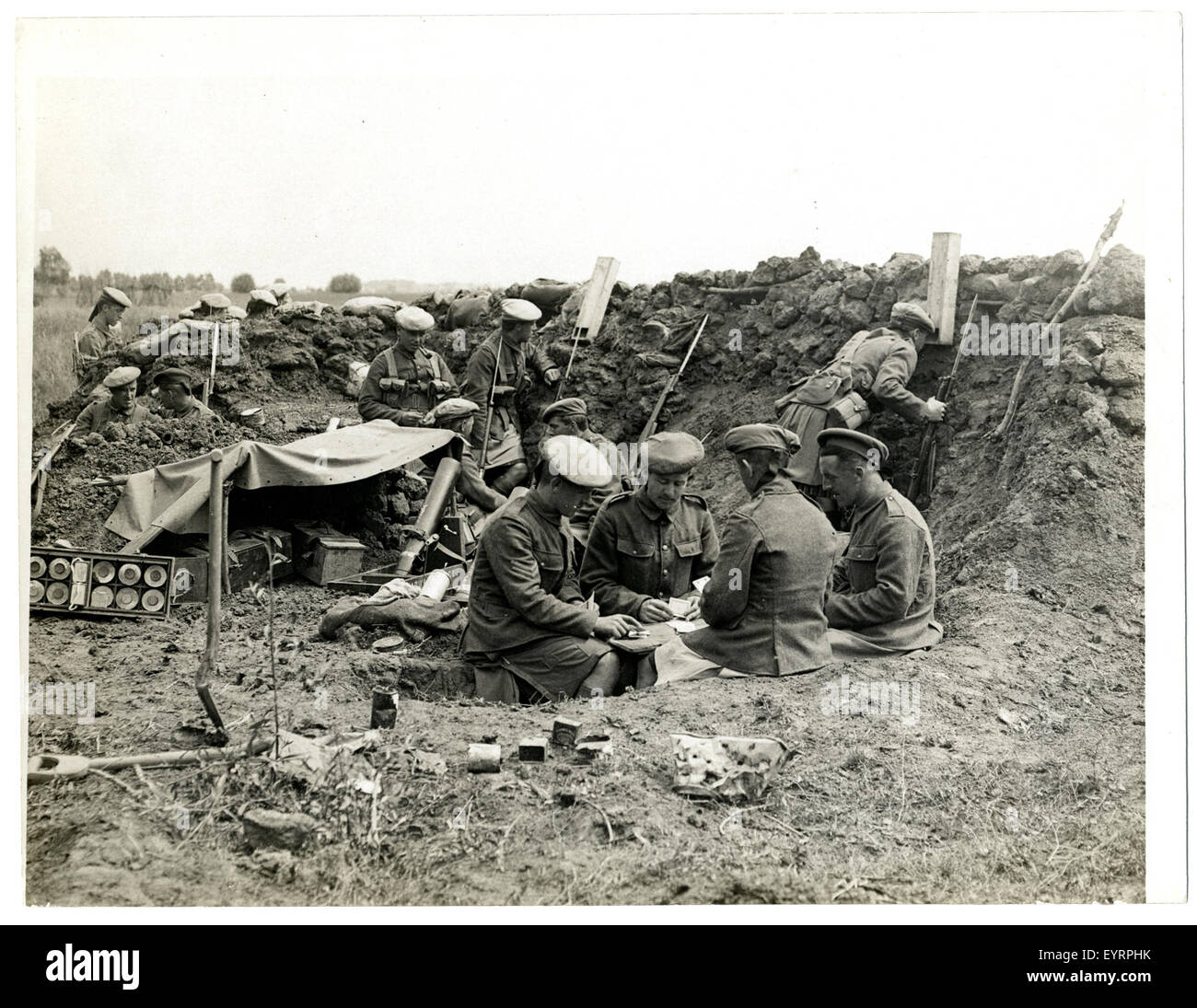 This image depicts a bomb gun section during World War I, showing ...