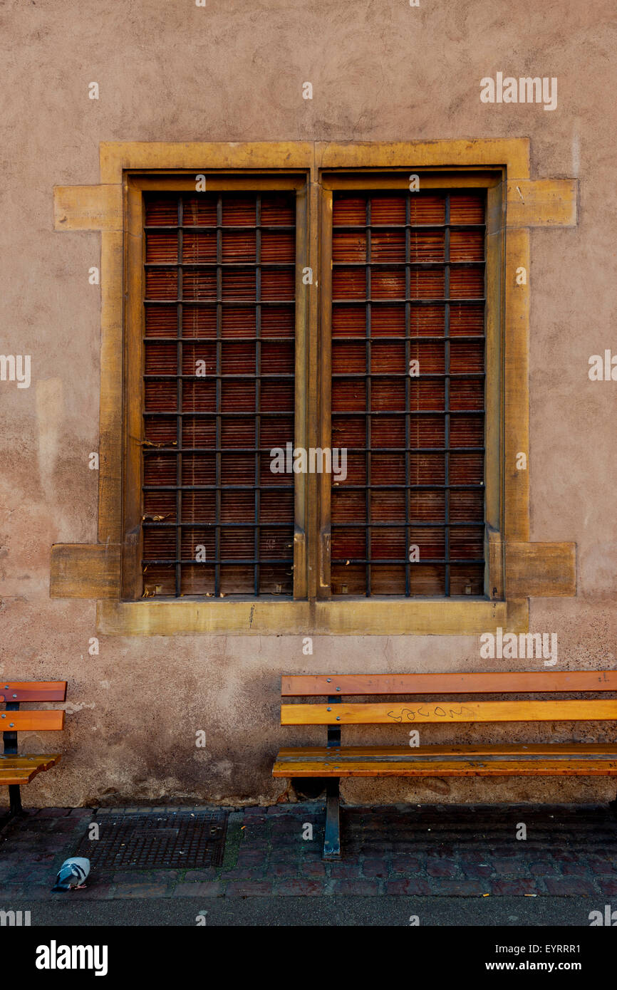 Barred window with bank Stock Photo - Alamy