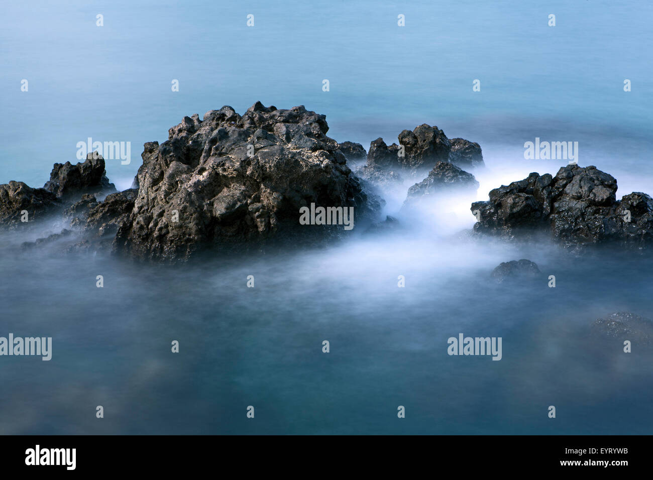 Lava rock on the sea Stock Photo - Alamy