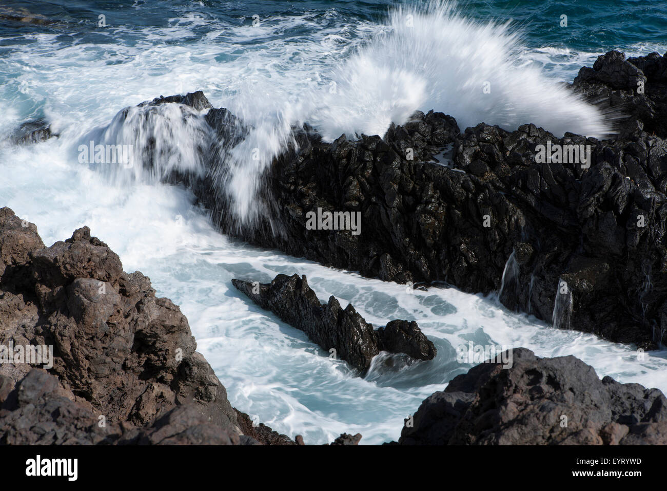 Lava rock on the sea Stock Photo - Alamy