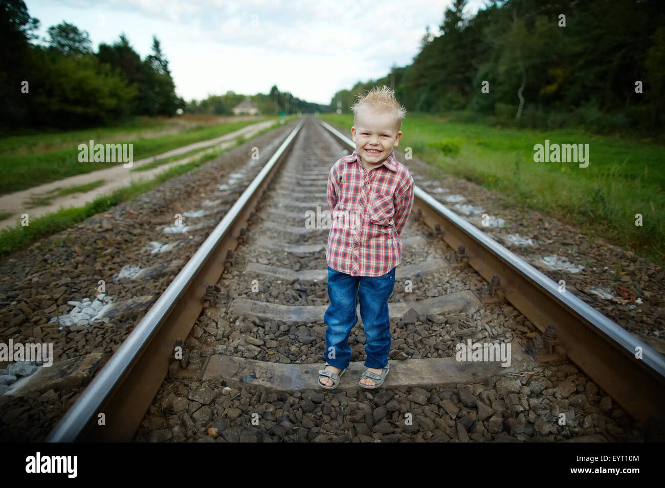 Boy on railroad track hi-res stock photography and images - Alamy