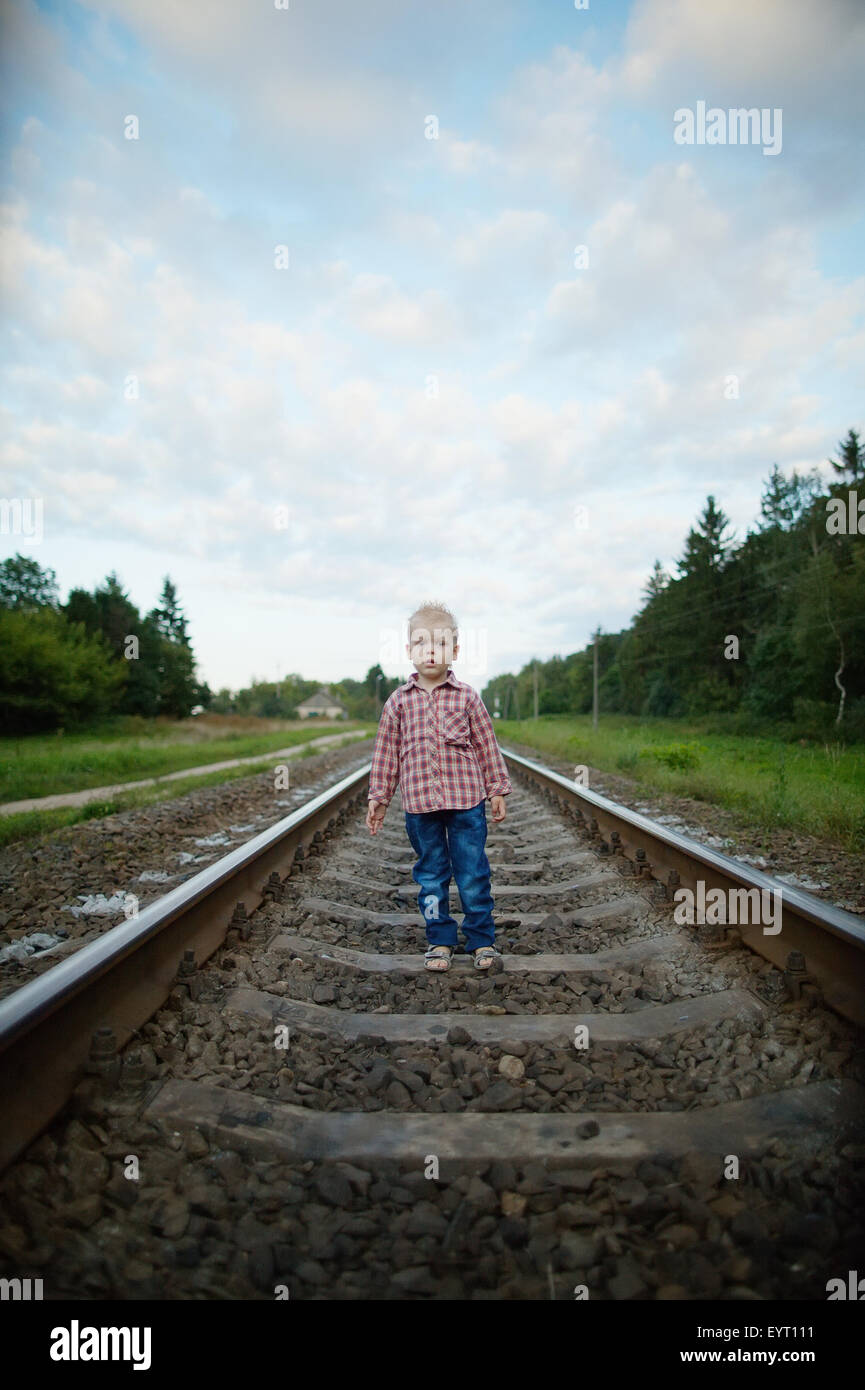 Boy on railroad track hi-res stock photography and images - Alamy