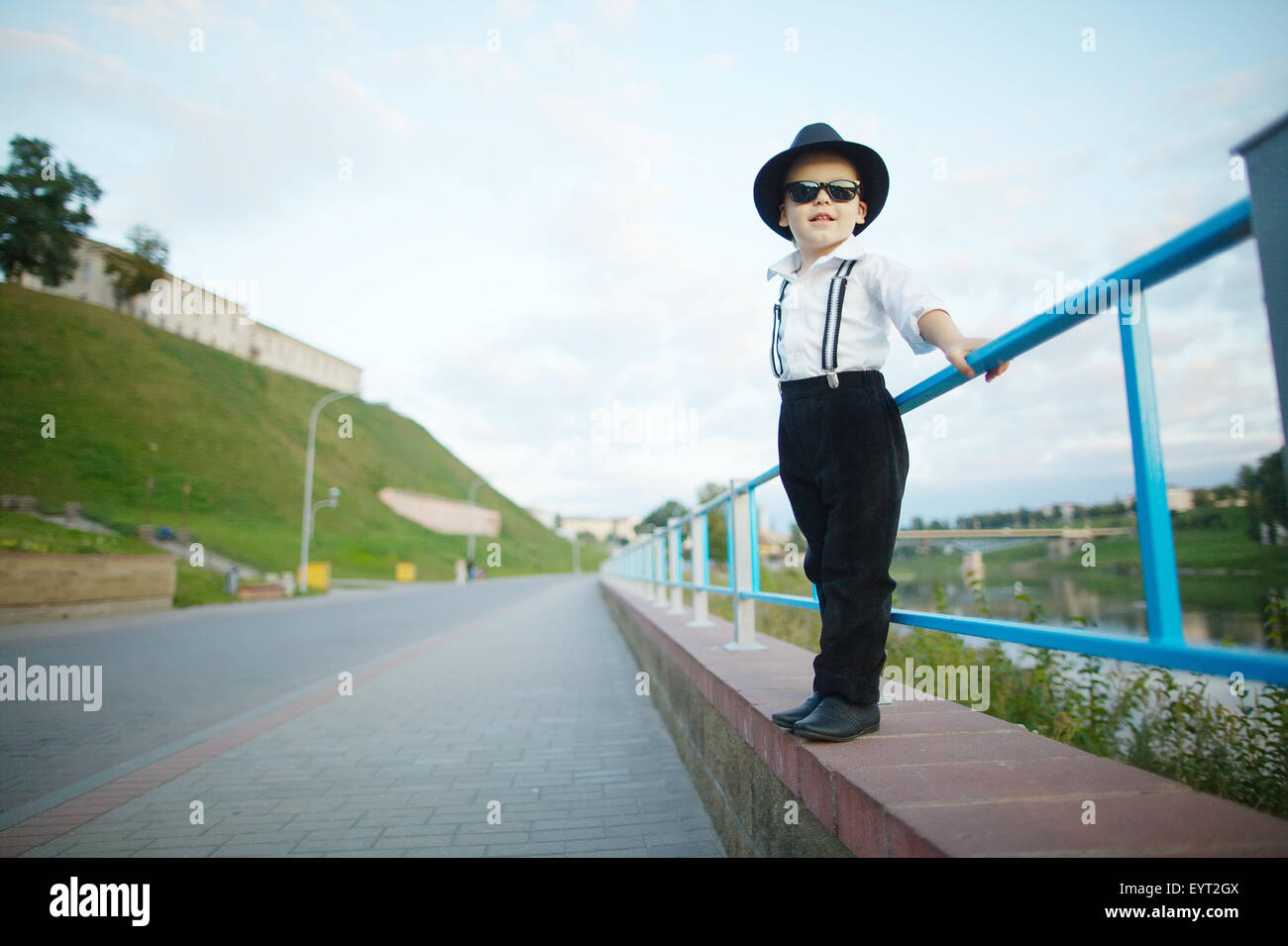 little gentleman with sunglasses outdoors Stock Photo - Alamy