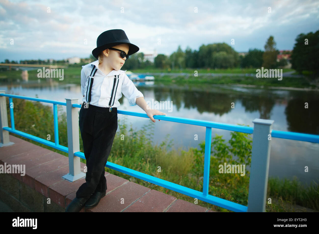 little gentleman with sunglasses outdoors Stock Photo - Alamy