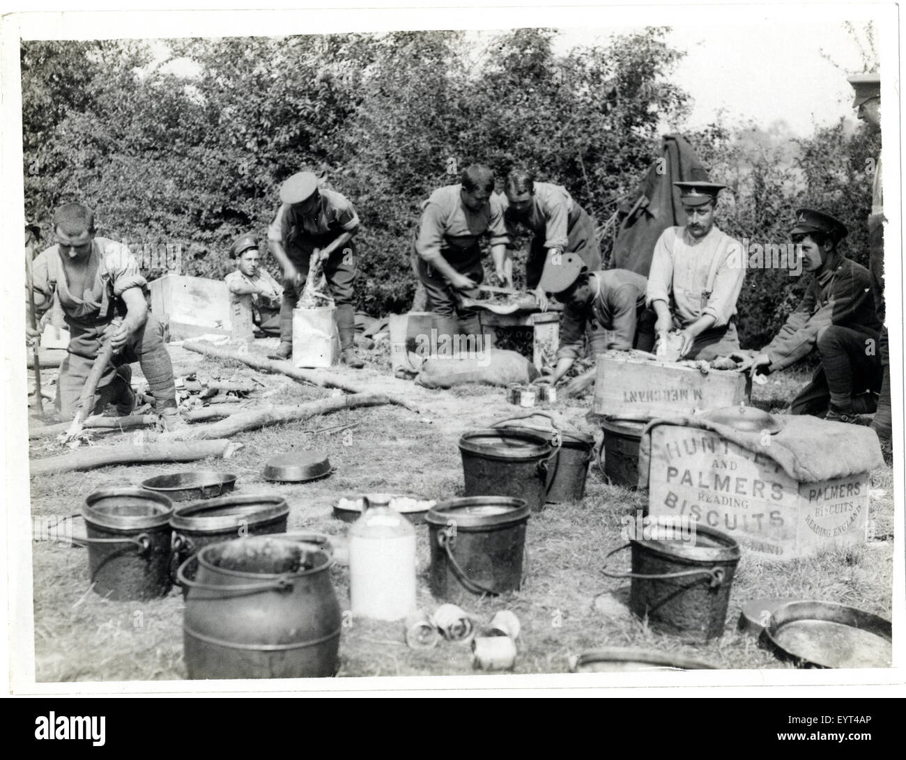 Photograph of cooks preparing meals in a field near Estaires, France ...