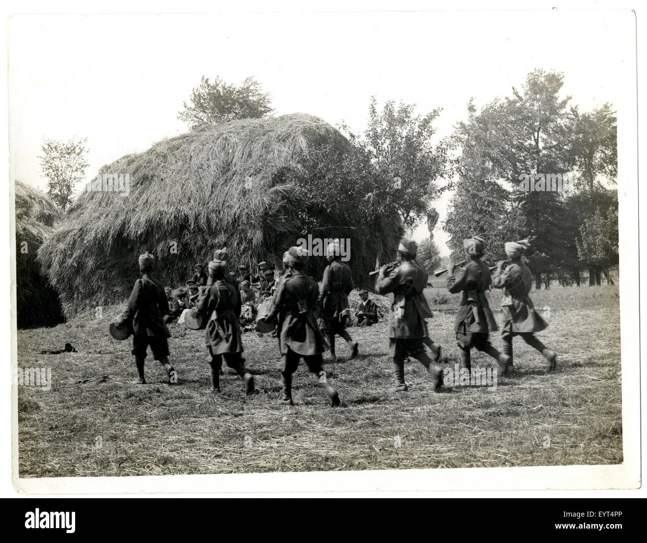 This image captures a Dhol and Sarnai band playing the French national ...