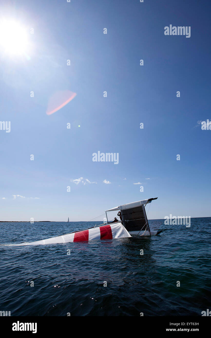 Capsized catamaran hi-res stock photography and images - Alamy