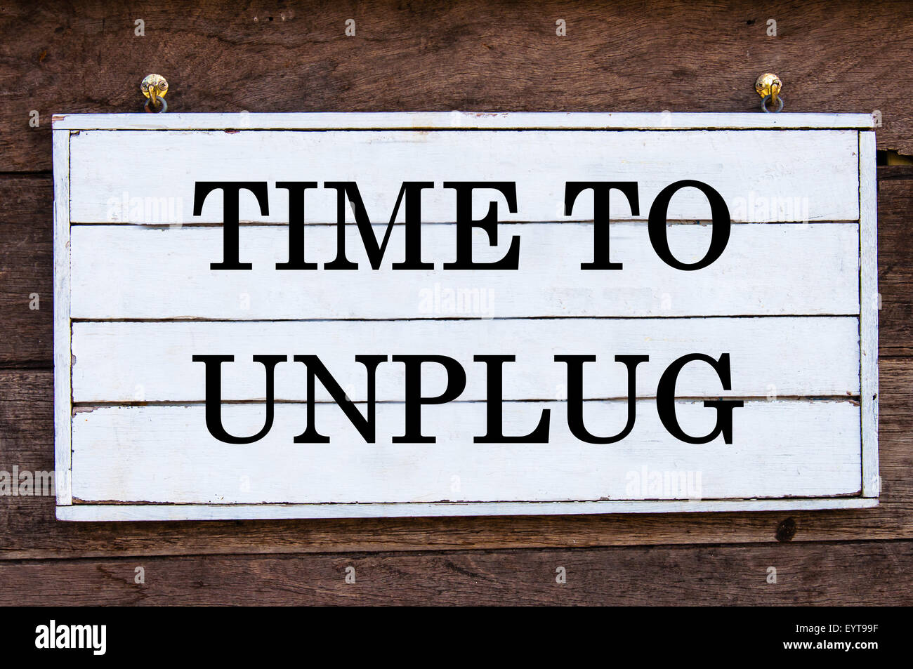 Time To Unplug Inspirational message written on vintage wooden board ...