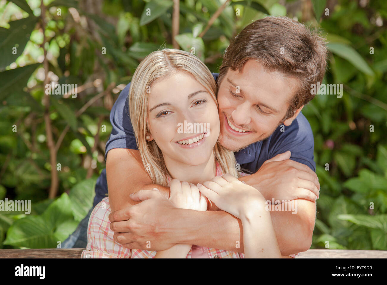 Couple in love hugging Stock Photo - Alamy