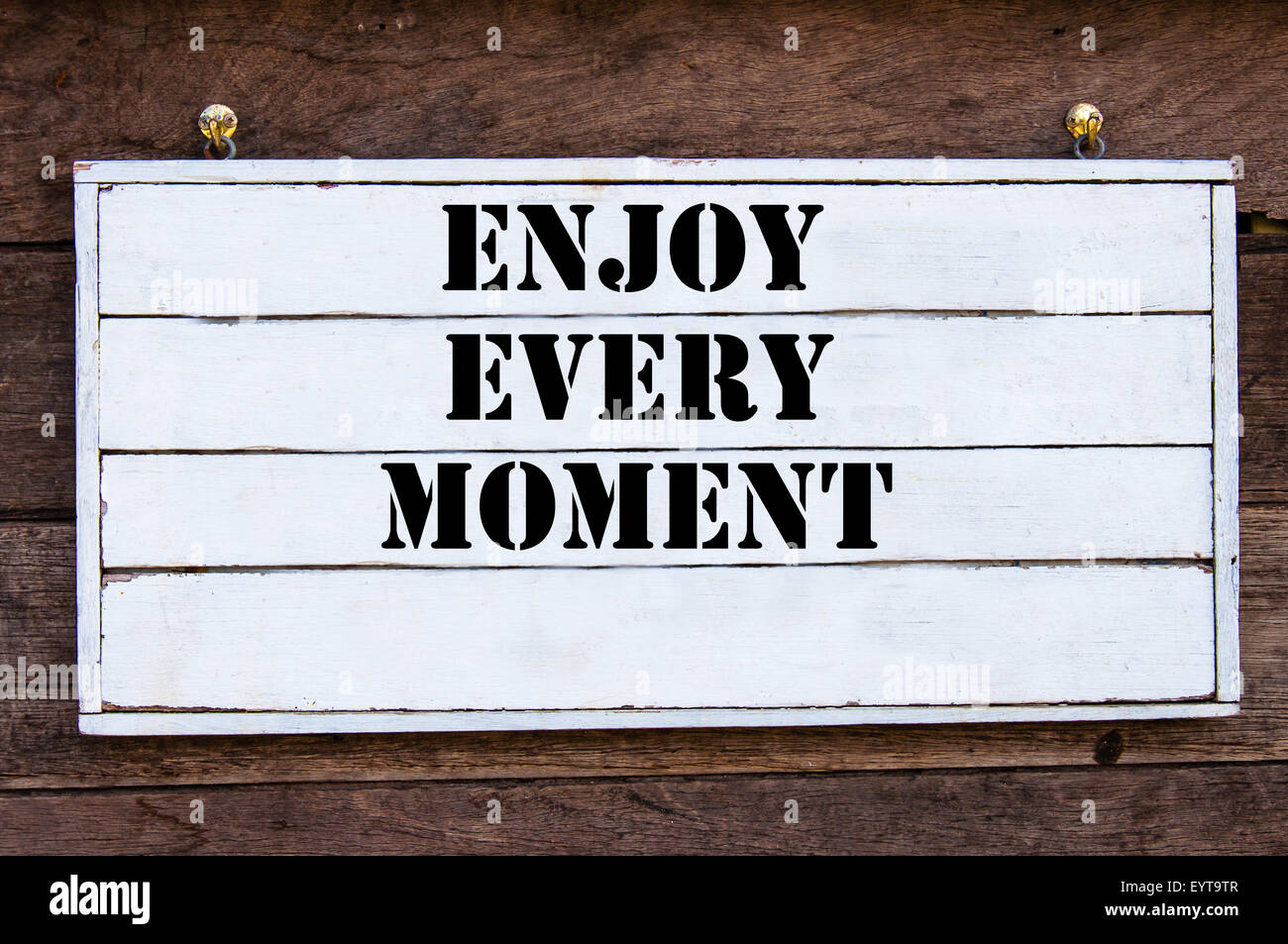 Enjoy Every Moment Inspirational message written on vintage wooden ...