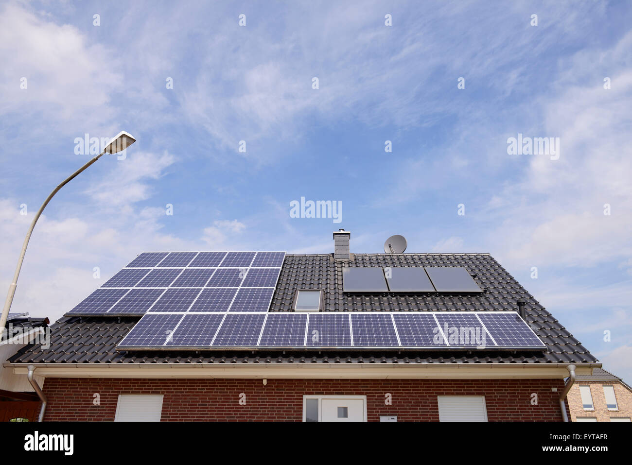 rooftop with solar cells, photovoltaics and solarthermics, Germany ...