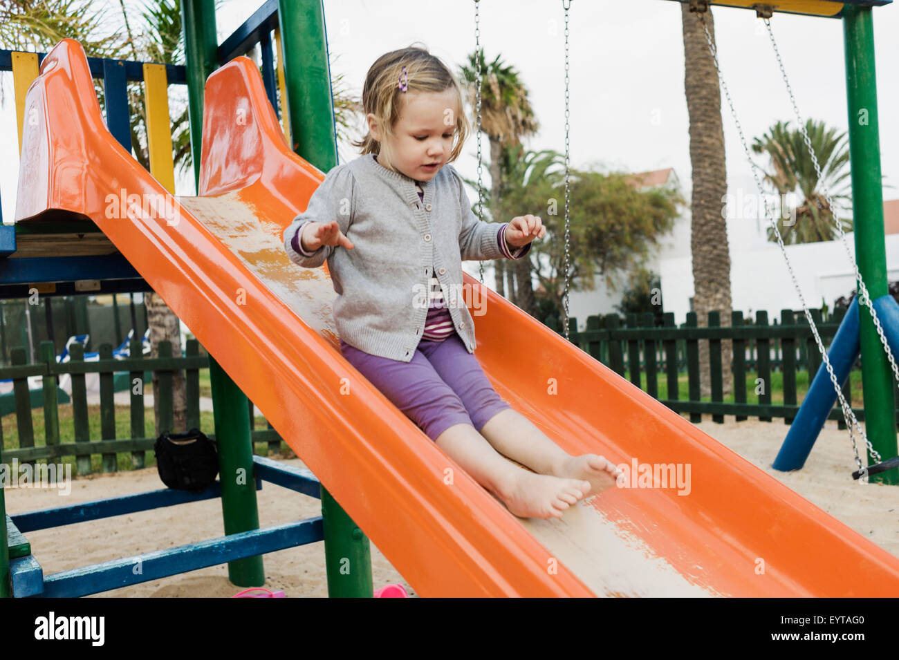 Girls, 3 years old, playground, sliding, slipping Stock Photo - Alamy