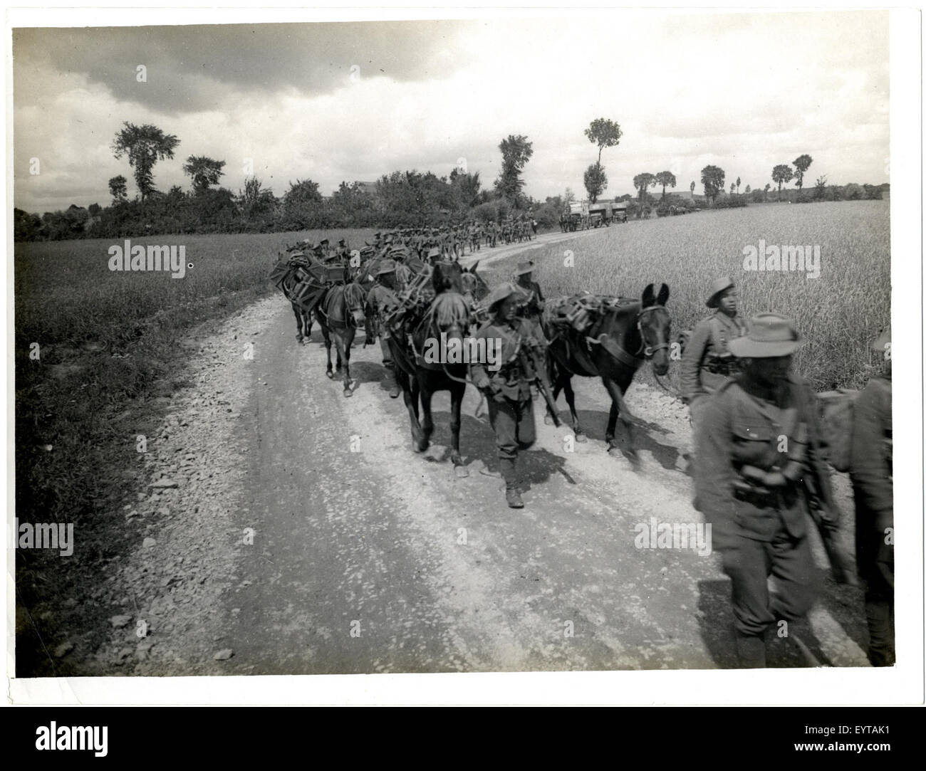 The image depicts a rural scene on a country road in France, near ...