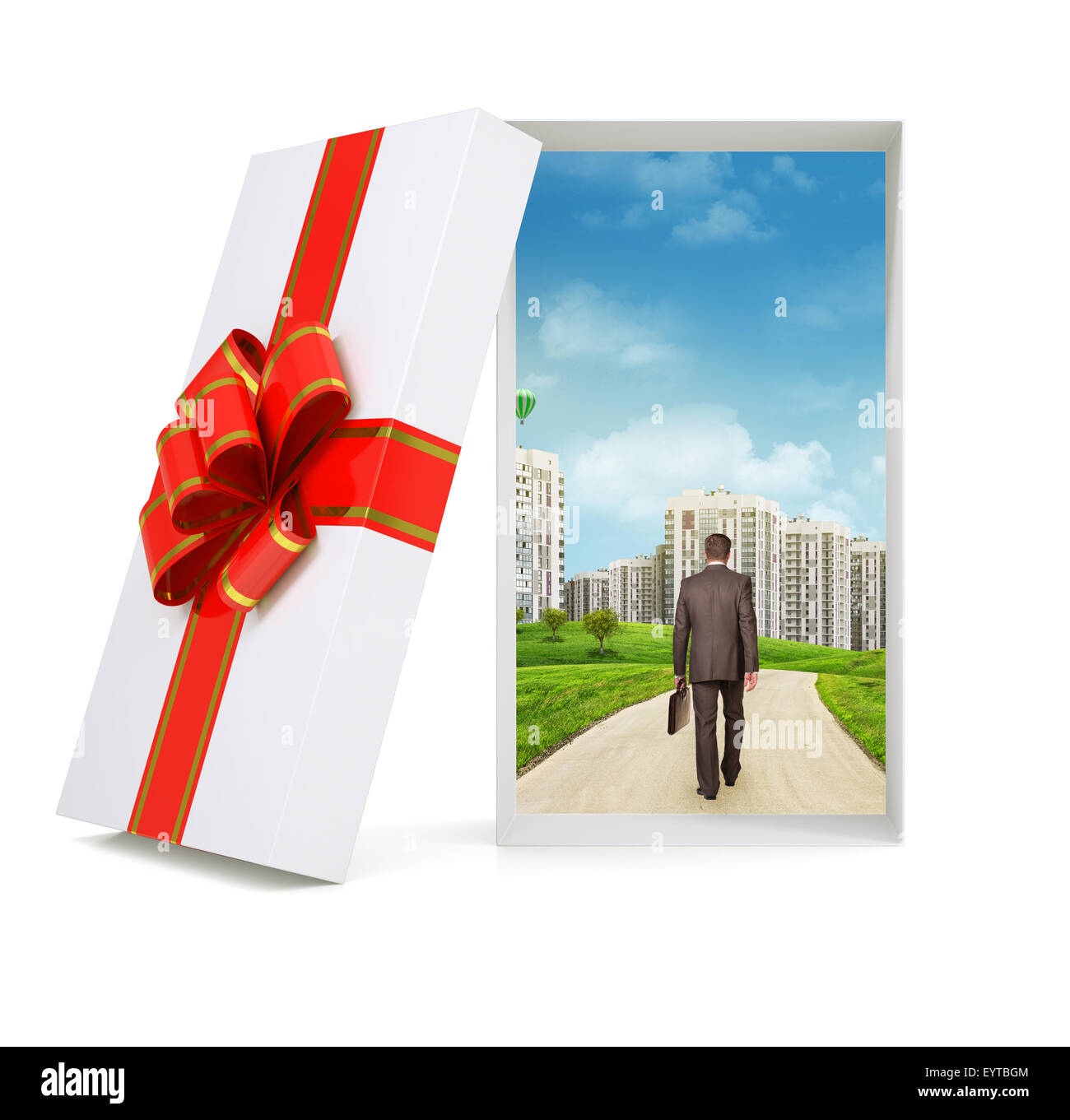 Cityscape with walking businessman in gift box Stock Photo - Alamy