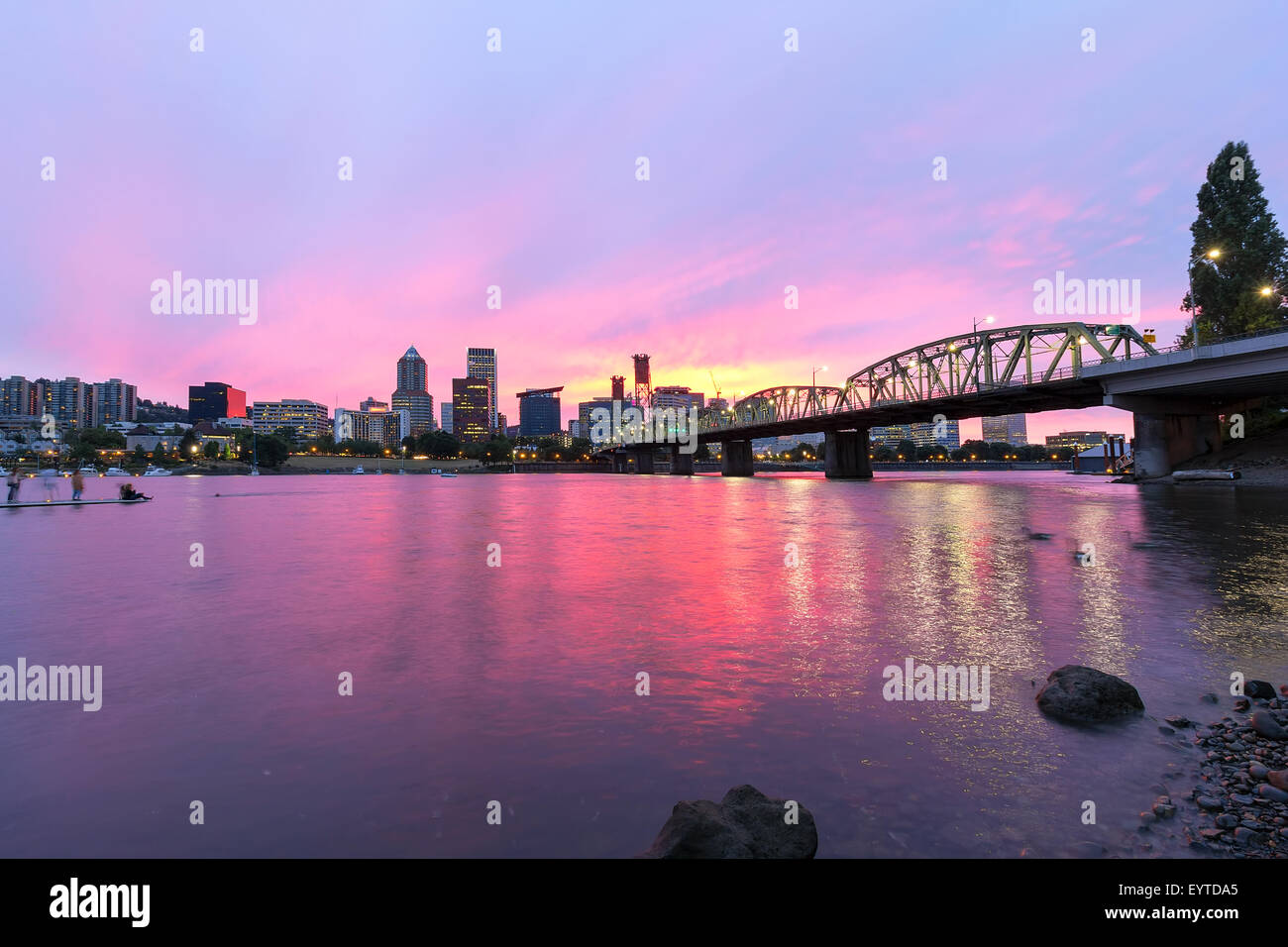 Pink Sunset over Portland Oregon downtown waterfront city skyline along ...