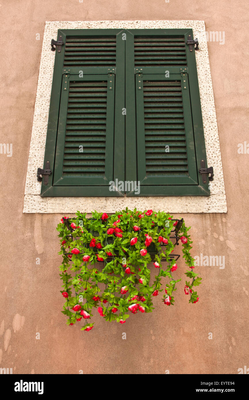 closed shutter with flowers Stock Photo - Alamy