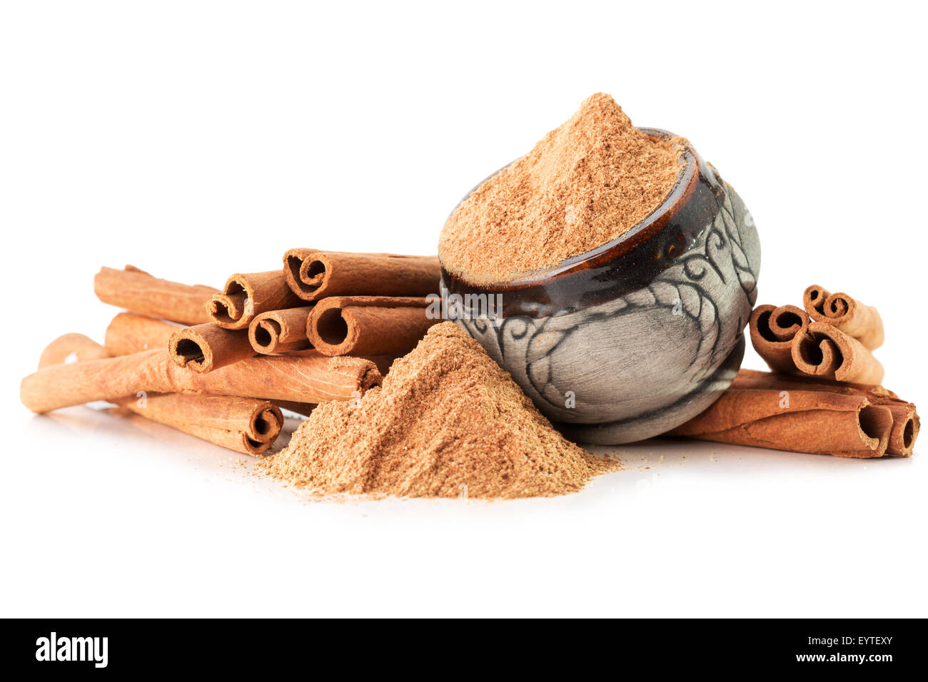 cinnamon sticks with powder isolated on white background Stock Photo ...