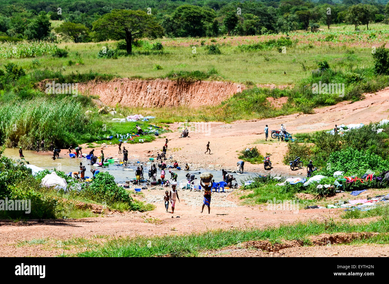 Laundry at the river in Angola Stock Photo - Alamy