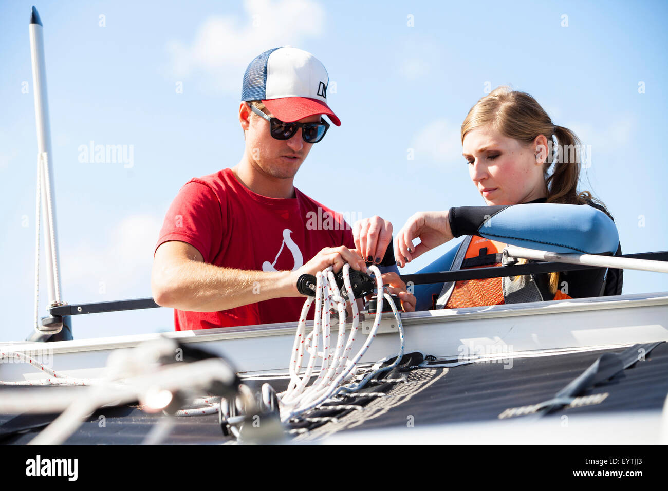 Sail lessons on catamaran, preparations for sailing Stock Photo - Alamy