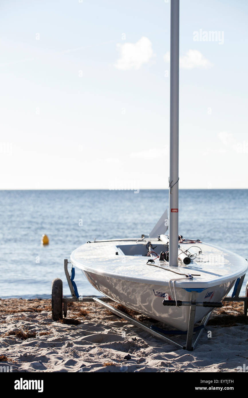 Laser sailboats on the beach Stock Photo - Alamy