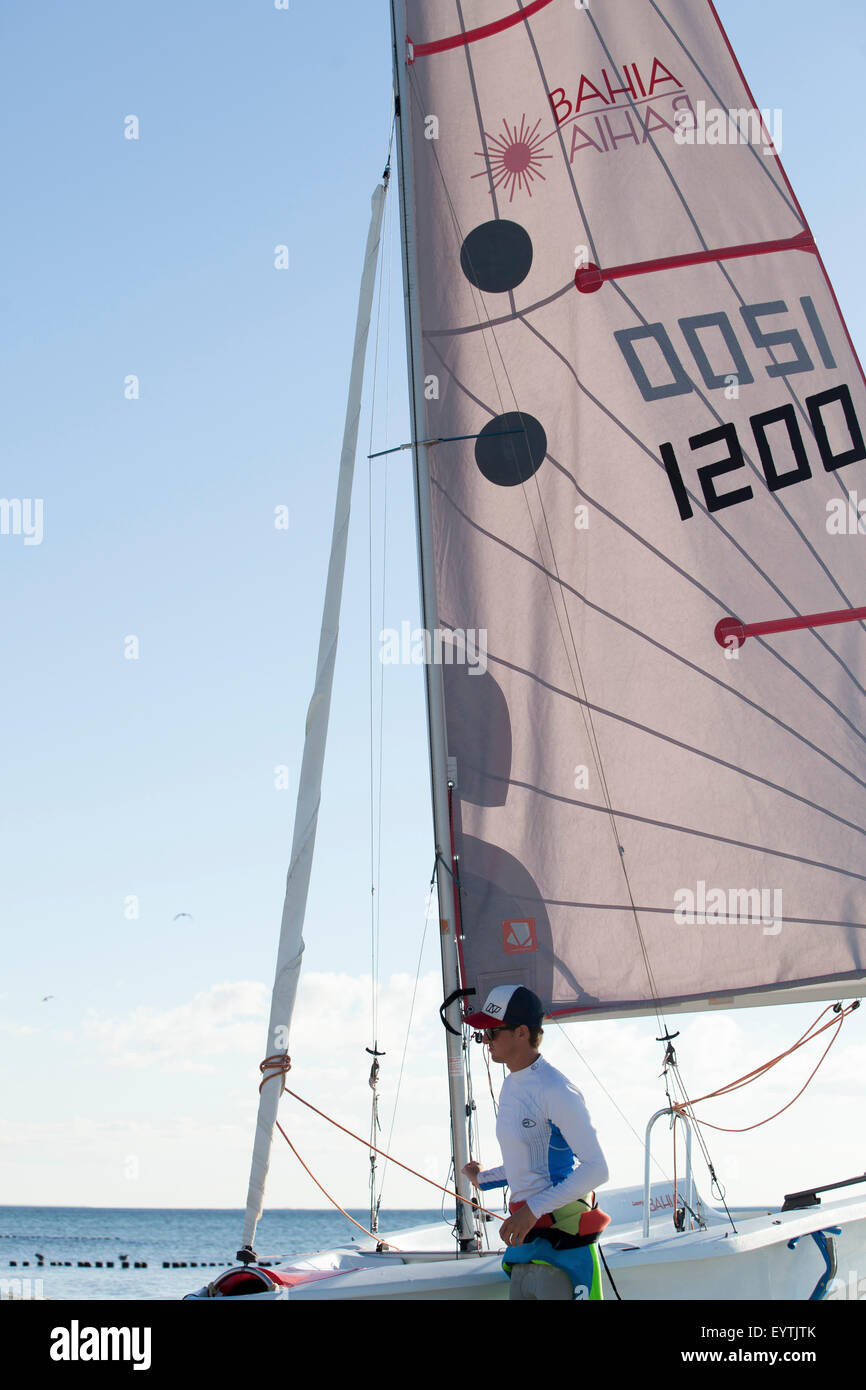 Man, sailing boats, boat, shore Stock Photo - Alamy