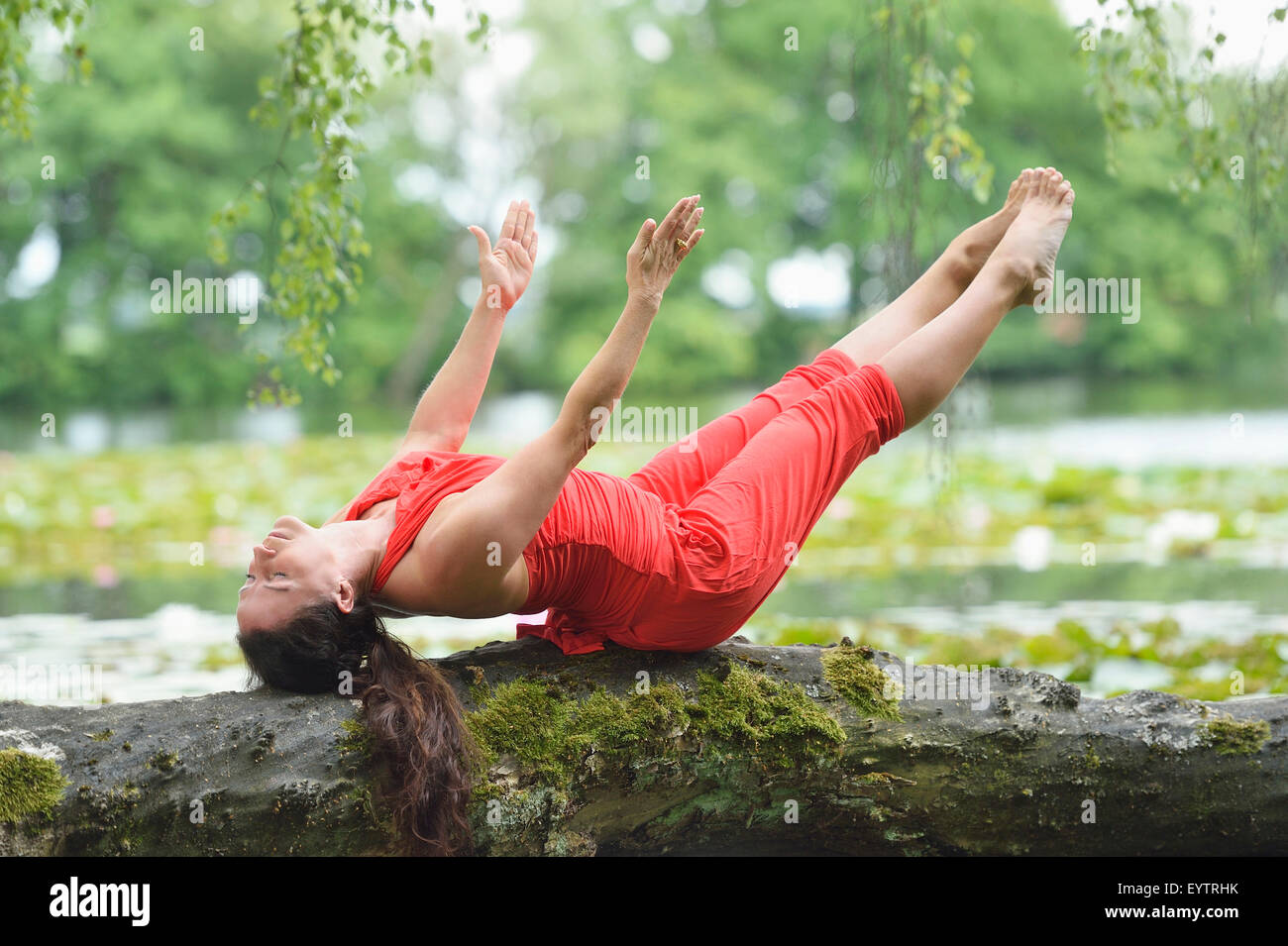 Woman, yoga, meditate, nature, side view Stock Photo - Alamy