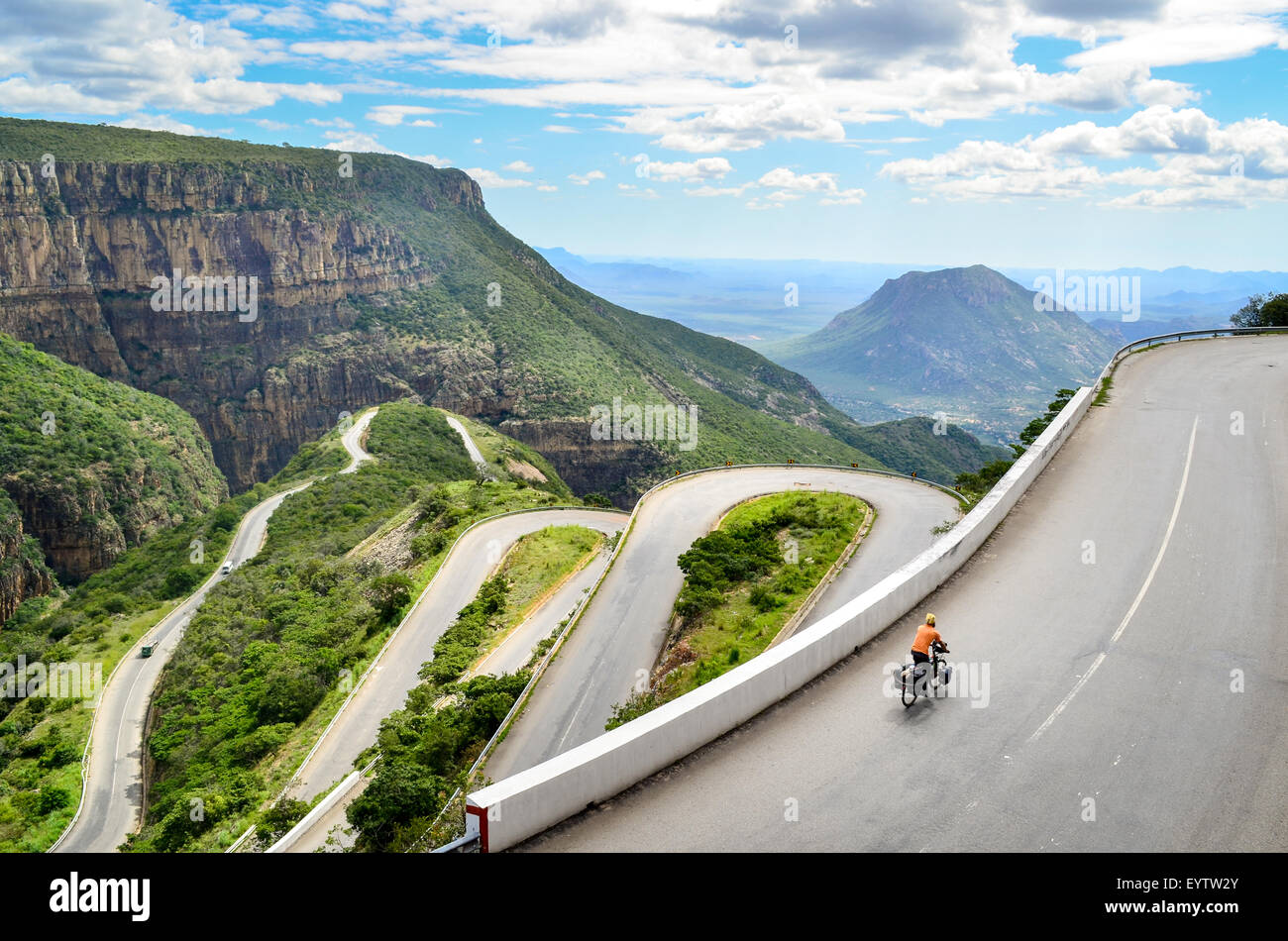 Cyclist on Serra da Leba, a mountain range in Angola featuring the ...