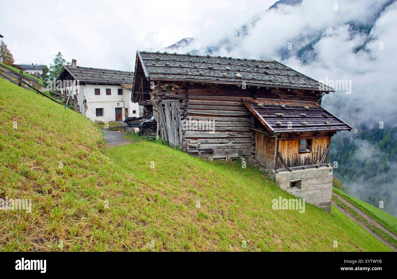 Mountain farm on steep slope Stock Photo - Alamy