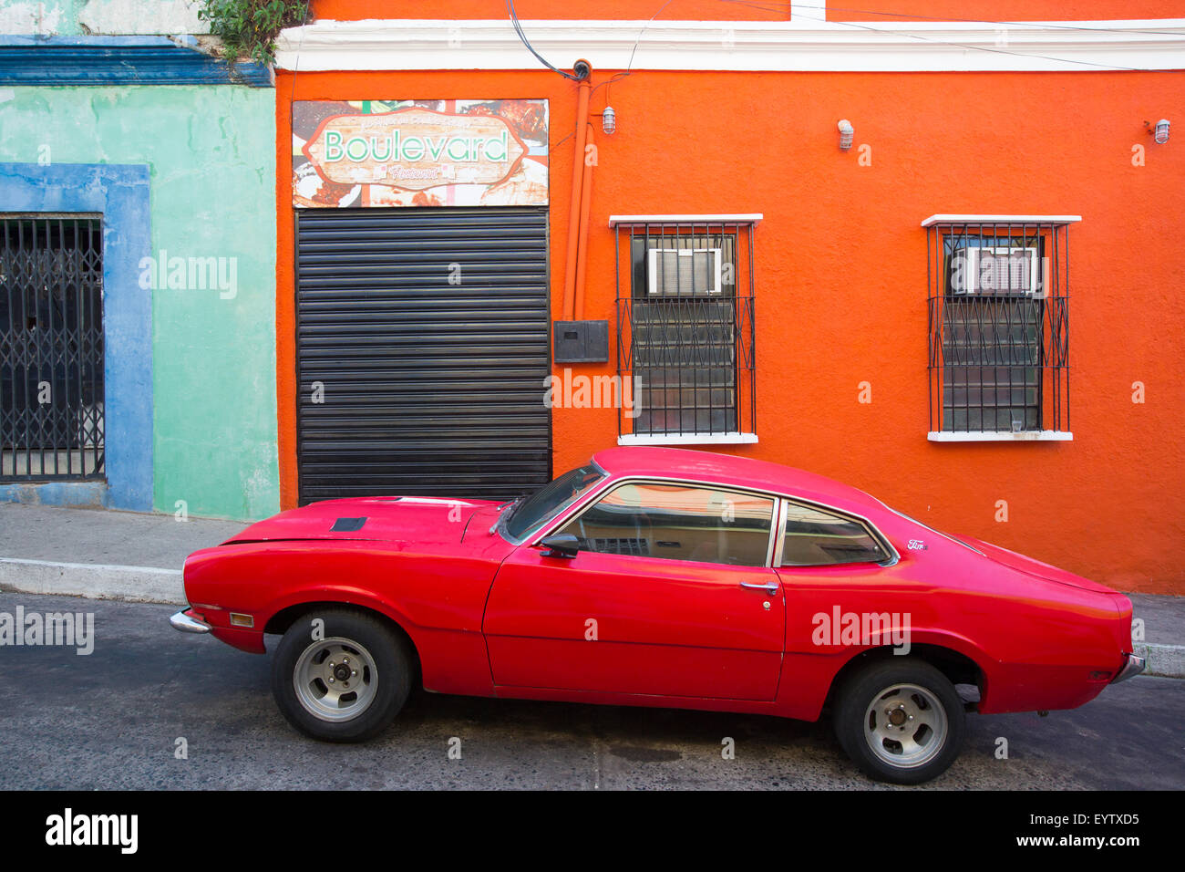 Old American car parked in the old colonial city of Ciudad Bolivar ...