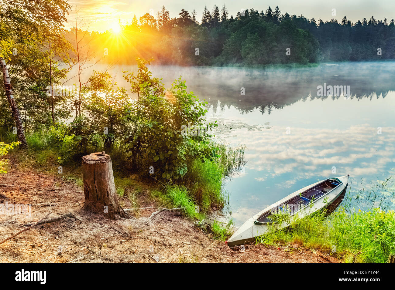 Canoe on a lake Stock Photo - Alamy