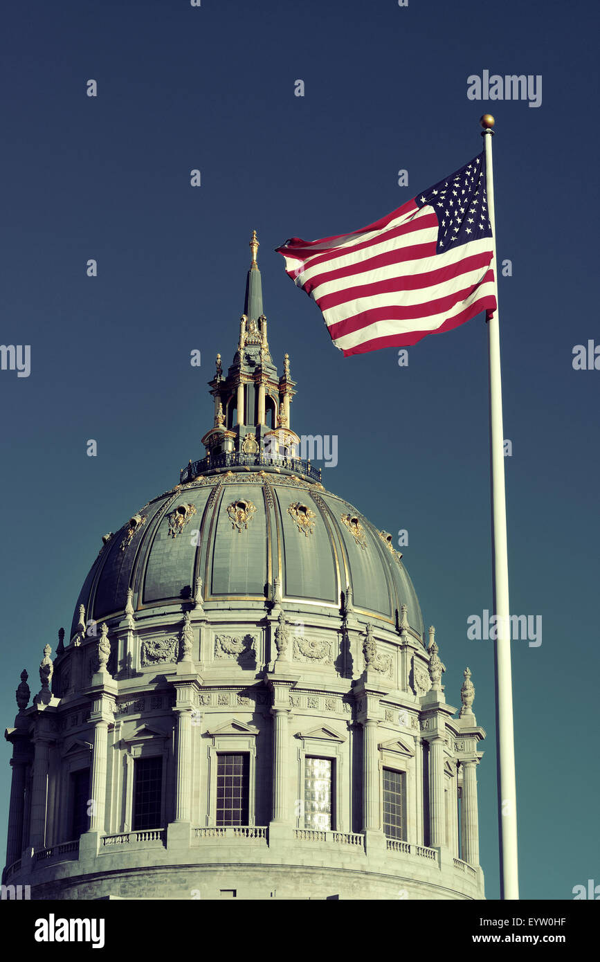San Francisco city hall with national flag as the famous historical ...