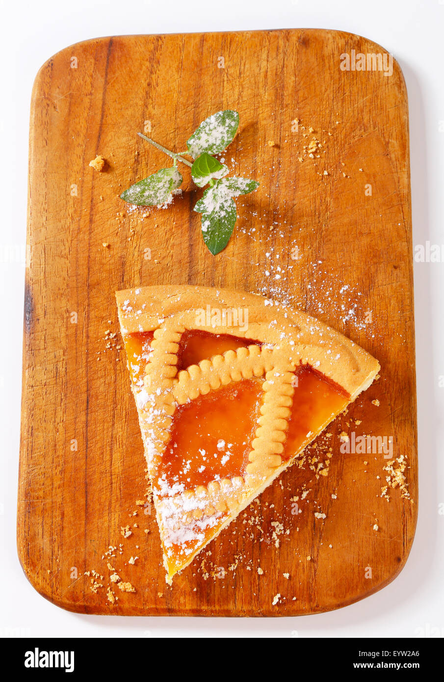 Slice of Linzer apricot tart Stock Photo - Alamy