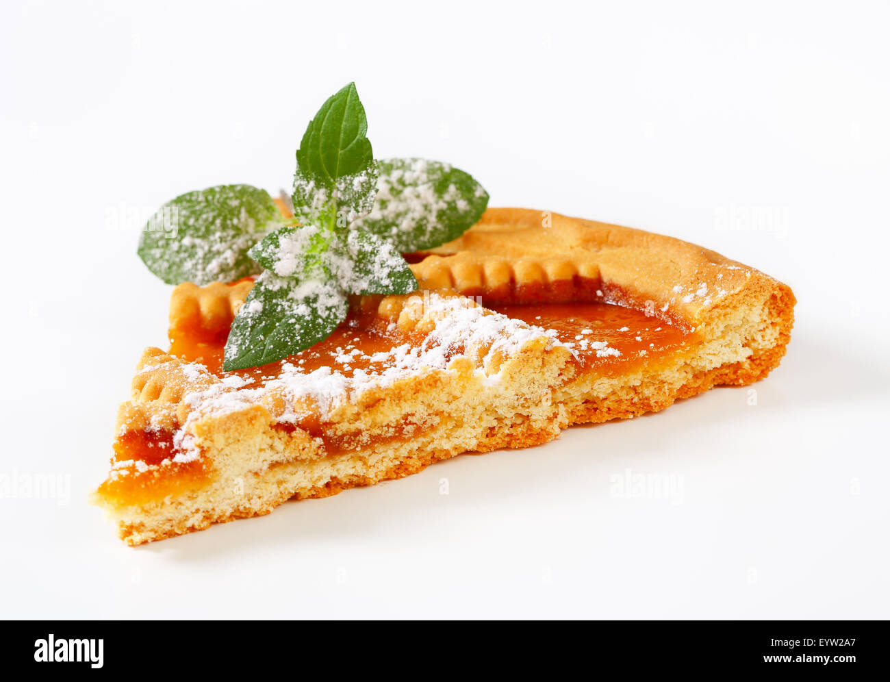 Slice of Linzer apricot tart Stock Photo - Alamy