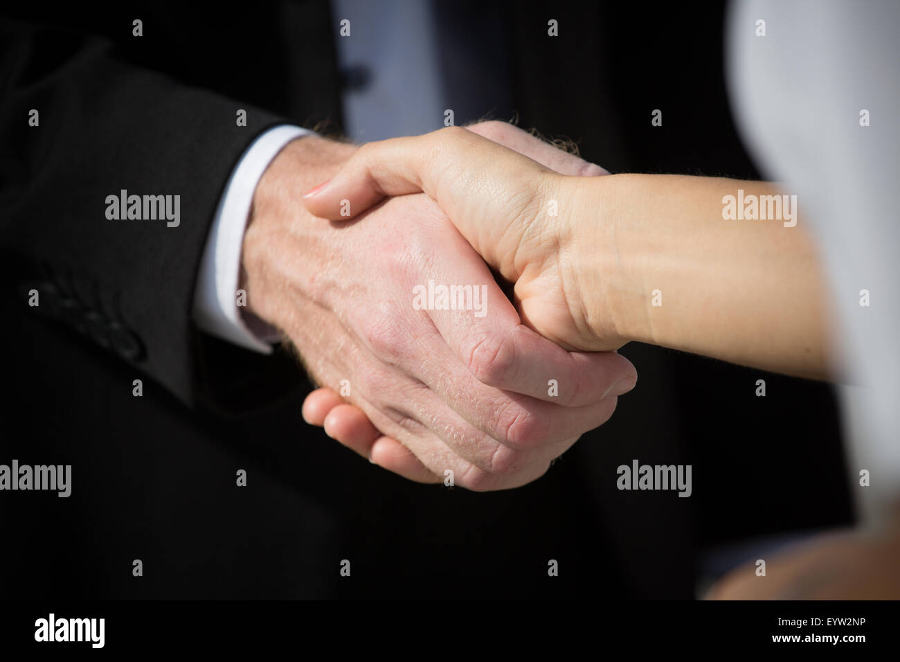 Handshaking hi-res stock photography and images - Alamy