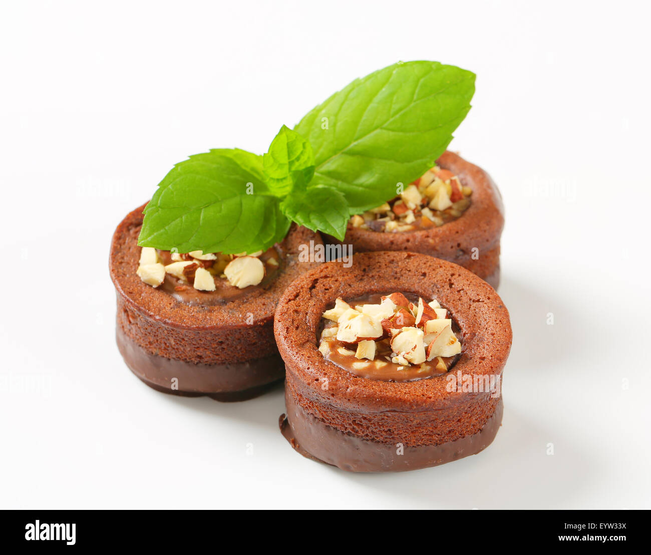 Mini chocolate cakes with hazelnut filling Stock Photo - Alamy