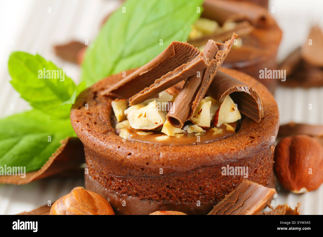 Mini chocolate cakes with hazelnut filling Stock Photo - Alamy