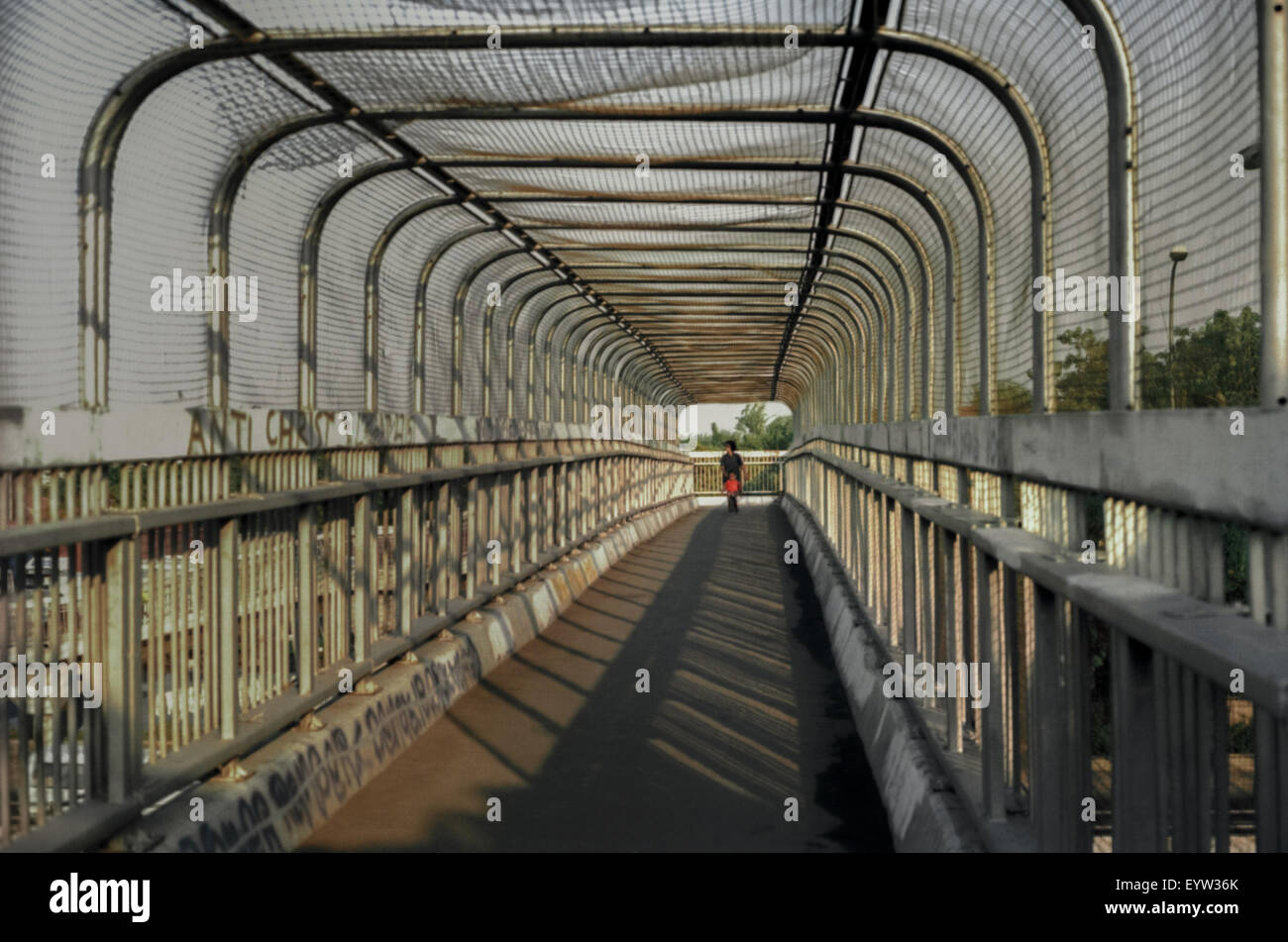 People passing through overpass Stock Photo - Alamy