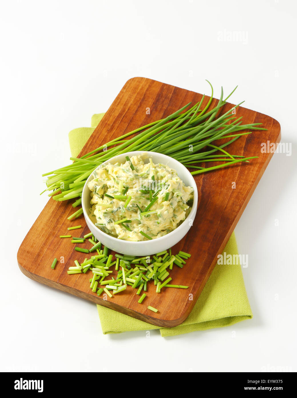 Bowl of homemade chive butter Stock Photo - Alamy