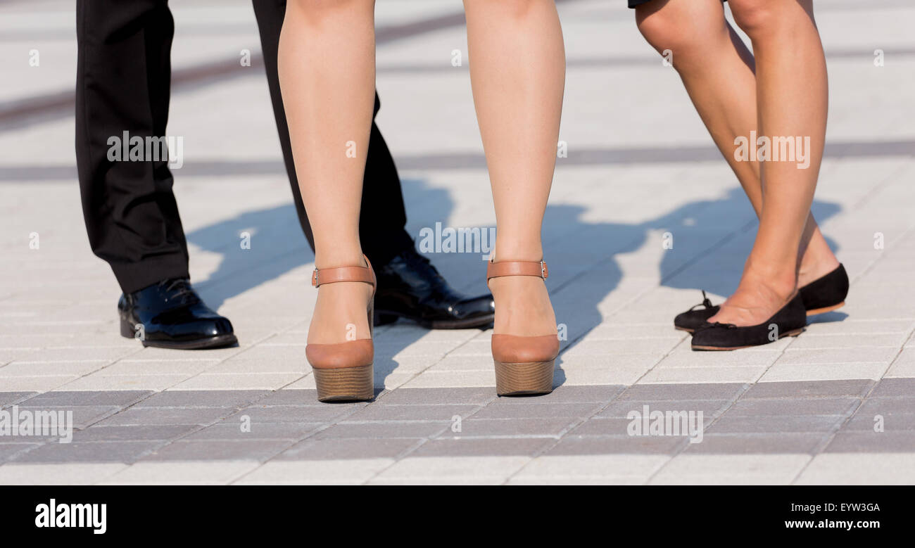 Legs of business people Stock Photo - Alamy