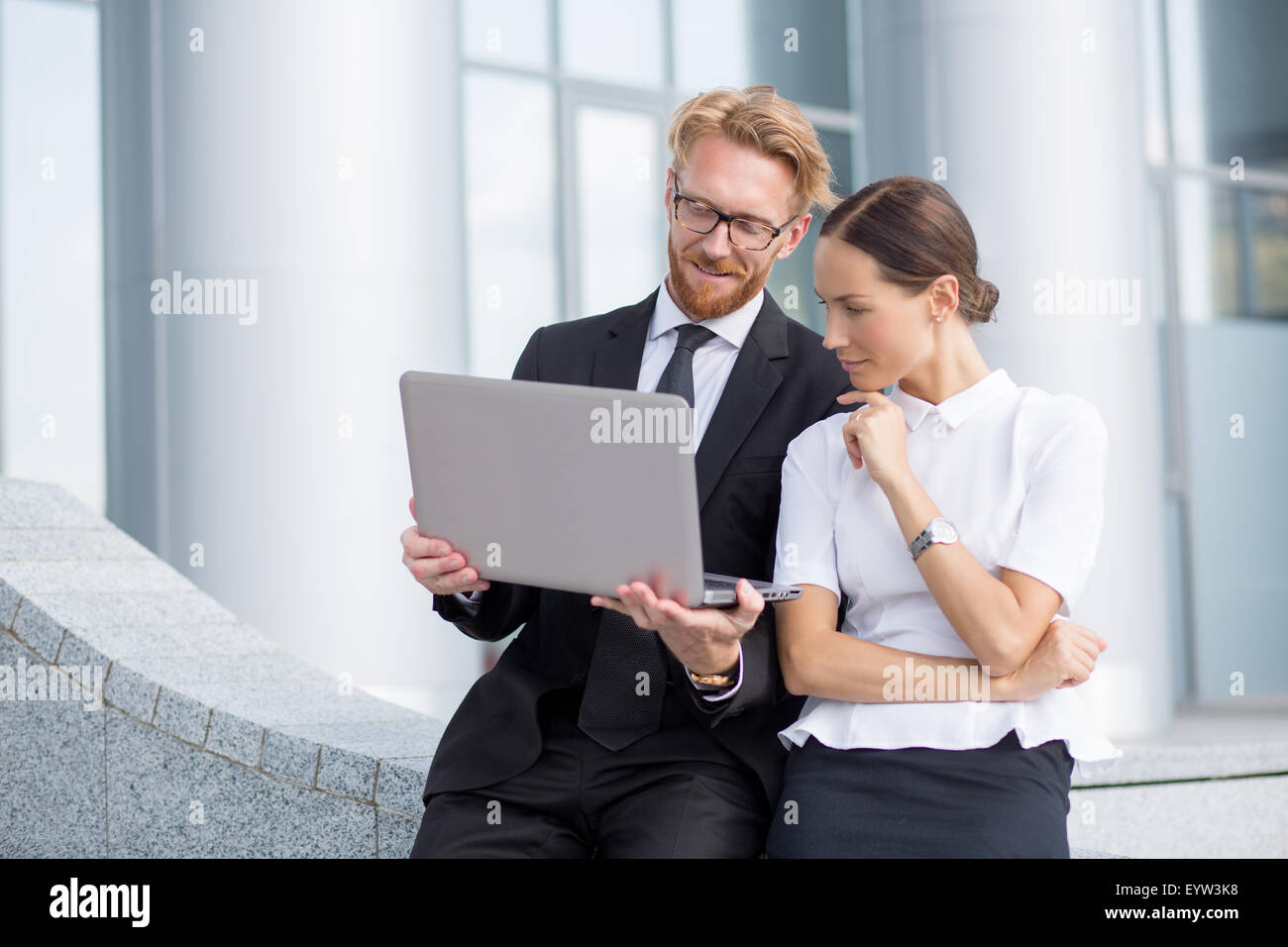 Business people with laptop Stock Photo - Alamy