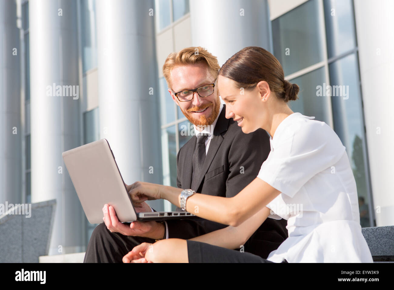 Business people with laptop Stock Photo - Alamy