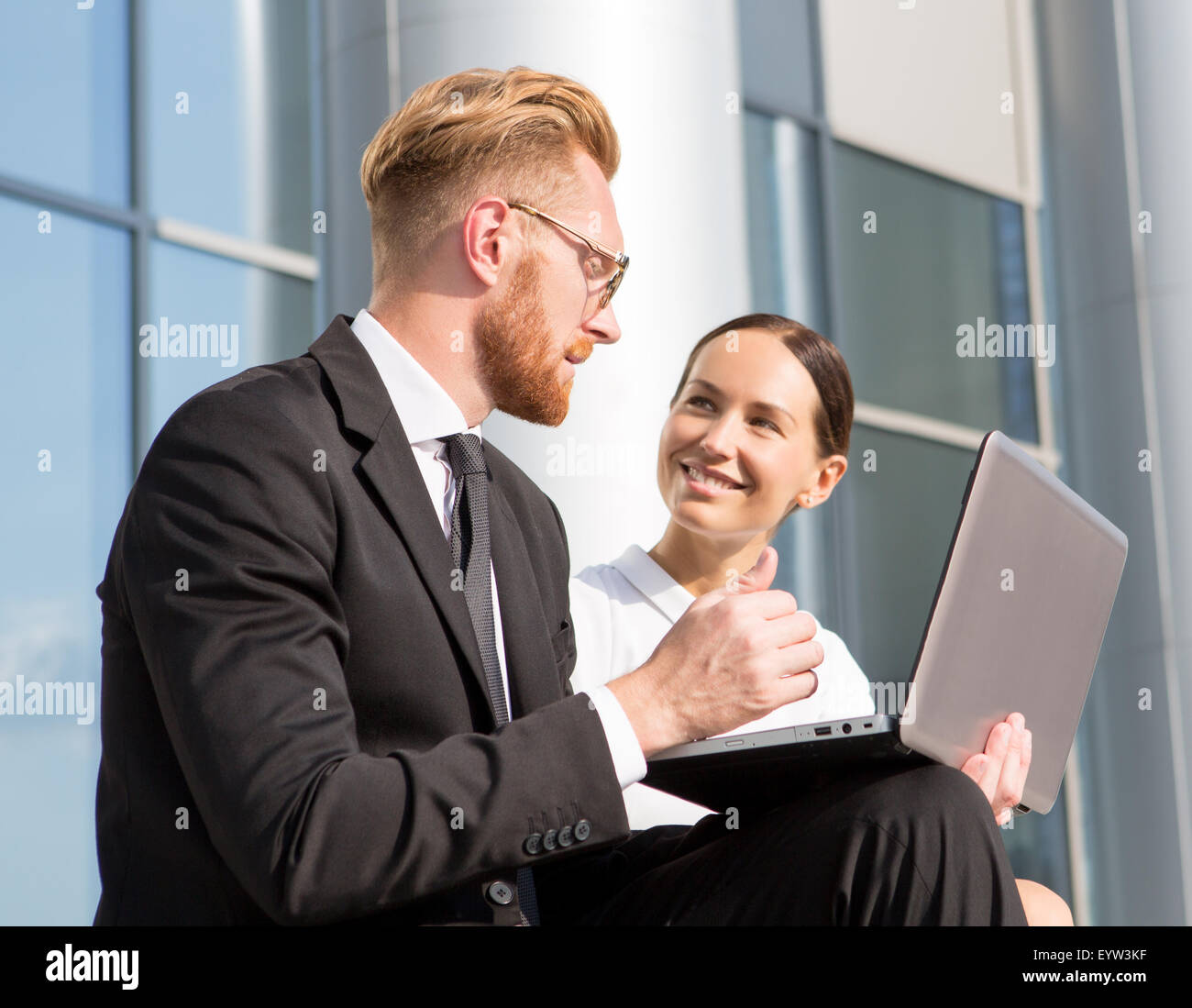 Business people with laptop Stock Photo - Alamy