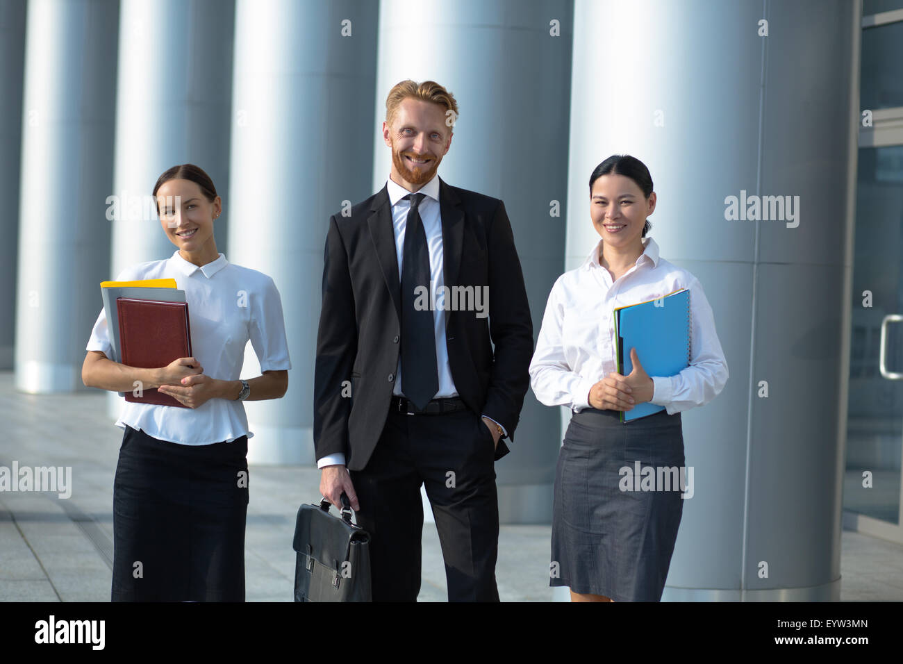 Business people walking Stock Photo - Alamy
