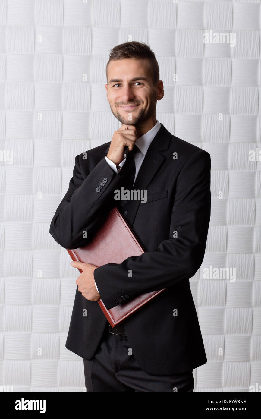 Handsome businessman business document hi-res stock photography and ...