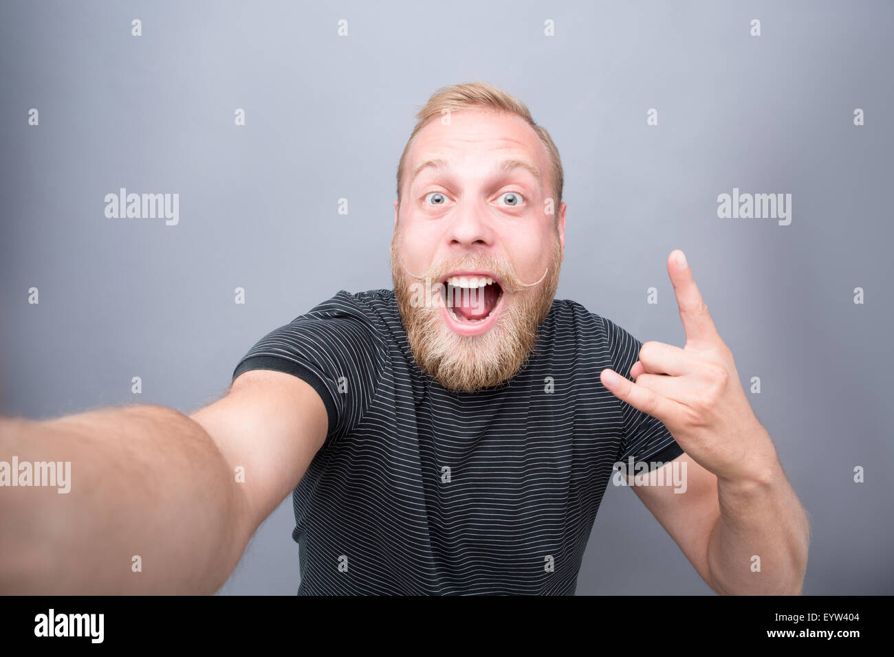 Smiling bearded man Stock Photo - Alamy