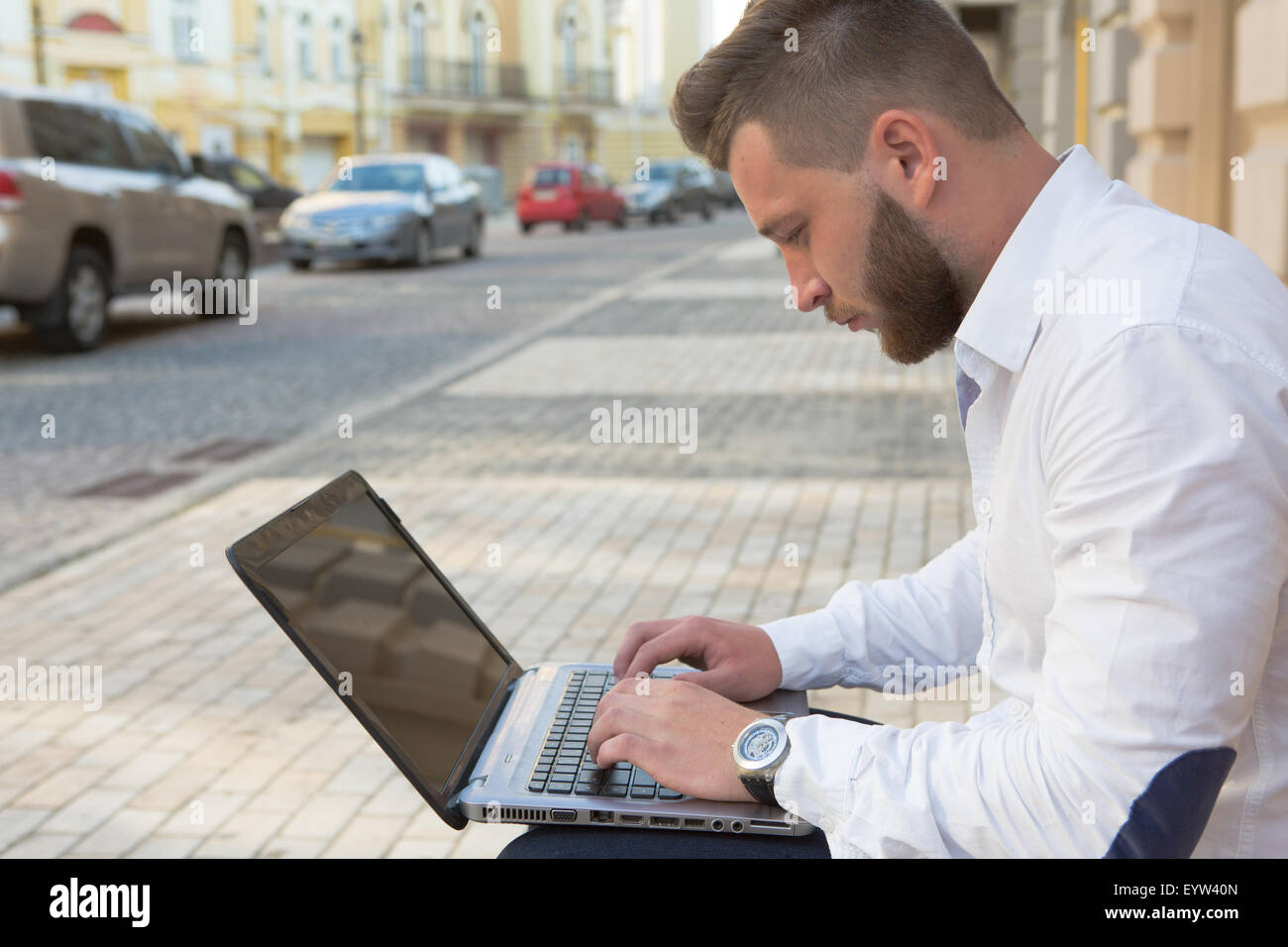 Man with laptop computer Stock Photo - Alamy