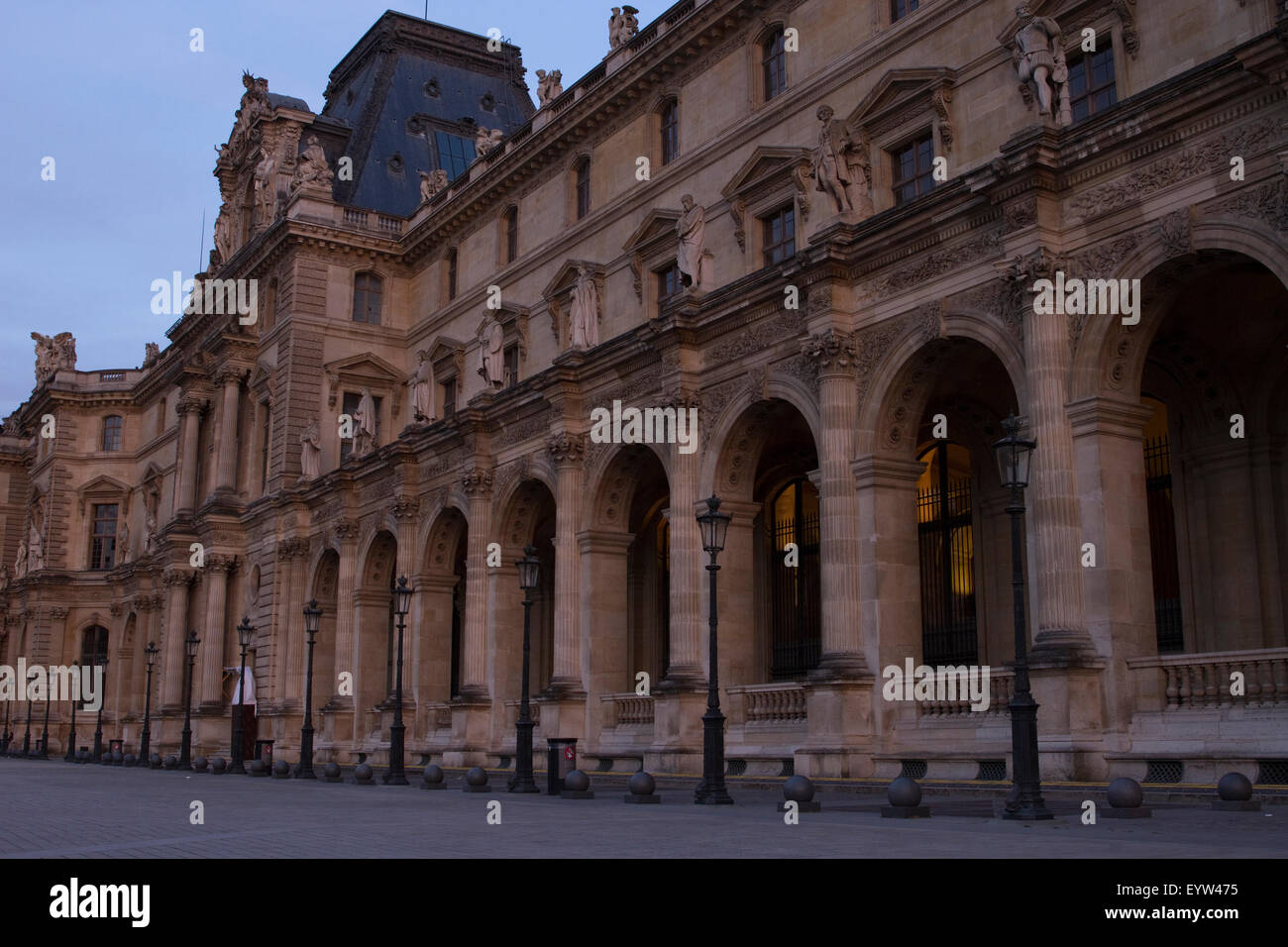 Pavillon Denon of the Louvre Palace (Palais du Louvre) at dusk Stock ...