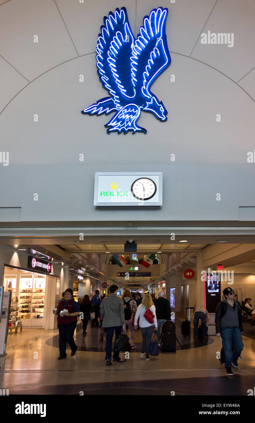 Neon Eagle sign, travelers and stores at LAX, Los Angles International ...