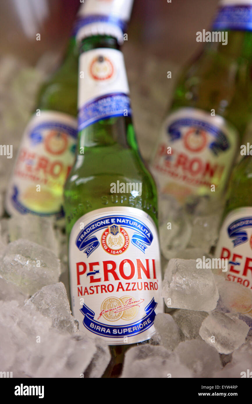 Bottles of Peroni lager cooling in an ice bucket Stock Photo - Alamy